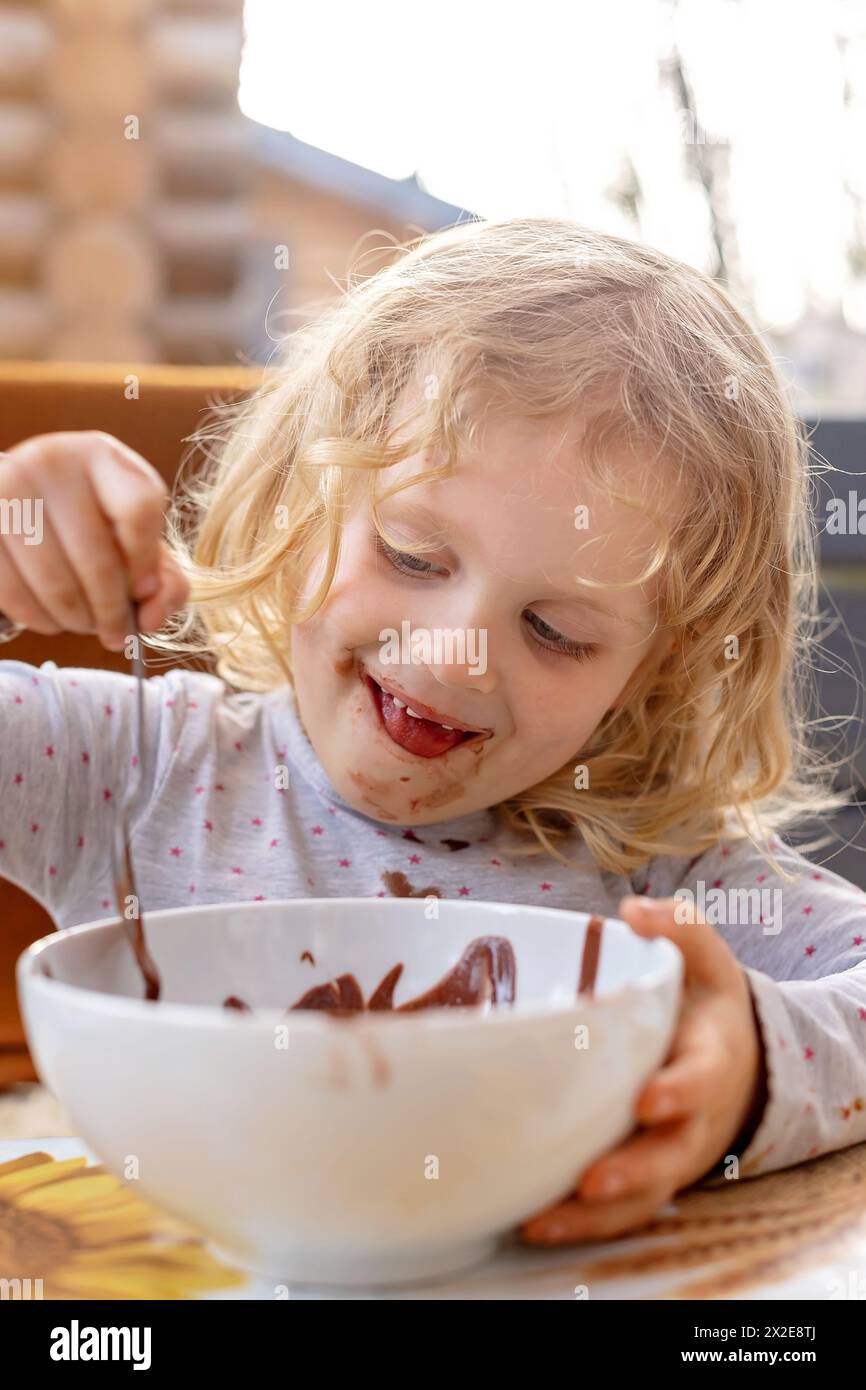 Children, kids, siblings, eating chocolate ice cream spring time ...