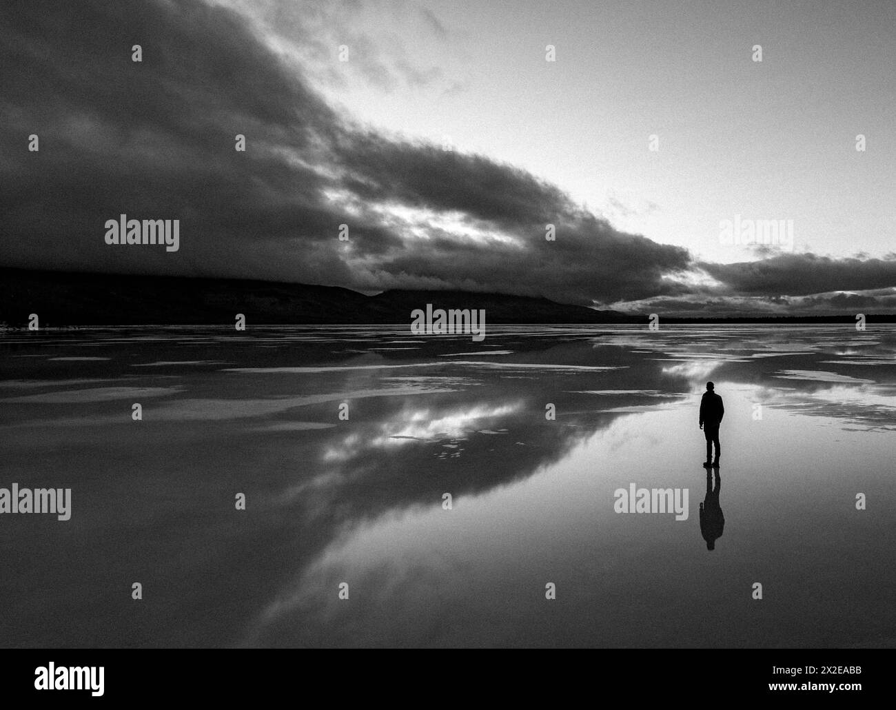 Lonely man in white stands hi-res stock photography and images - Alamy