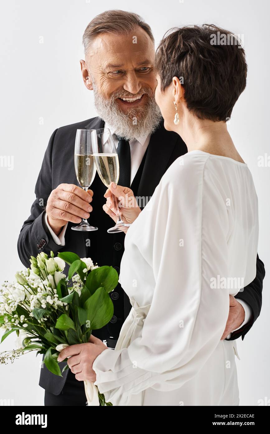 Man tuxedo toasting hi-res stock photography and images - Alamy
