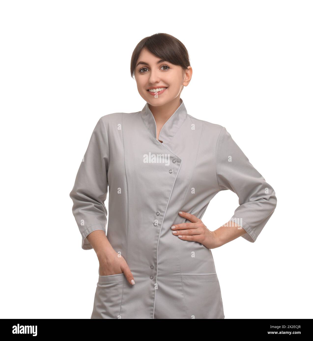 Cosmetologist in medical uniform on white background Stock Photo - Alamy