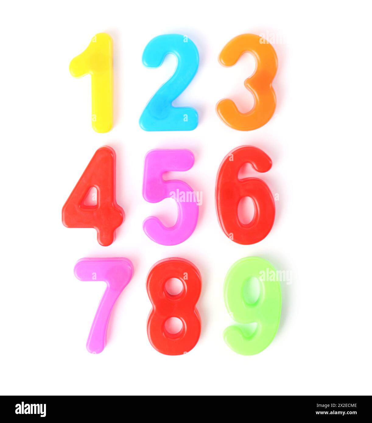 Colorful numbers on white background, top view Stock Photo - Alamy