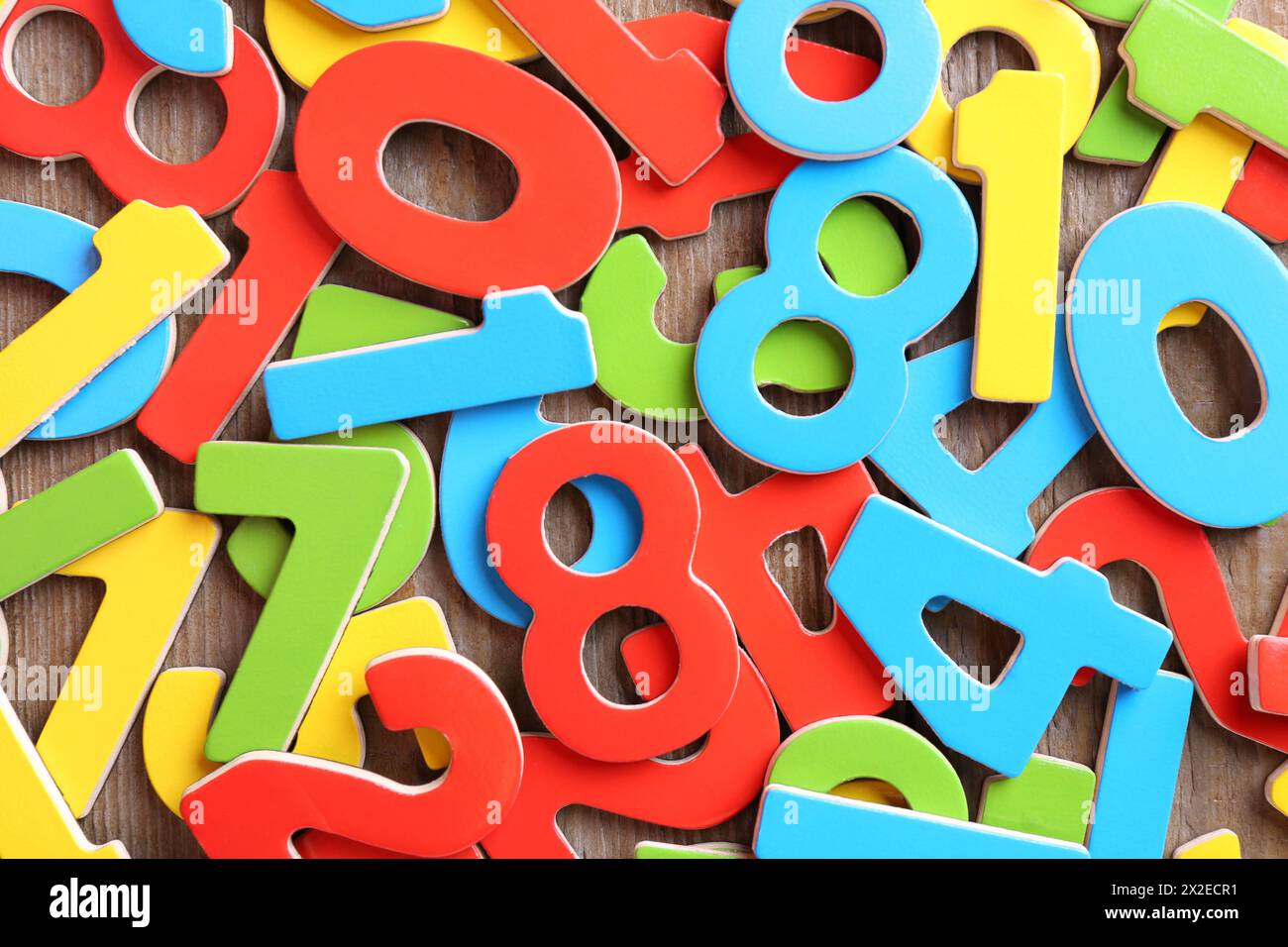 Colorful numbers on wooden table, flat lay Stock Photo - Alamy