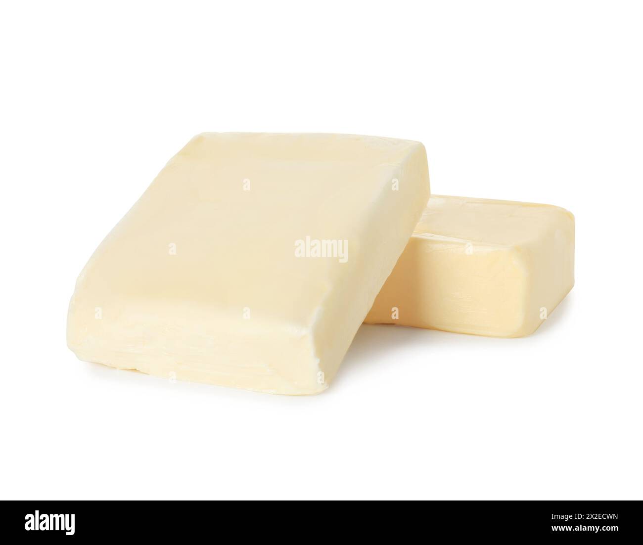 Blocks of tasty butter isolated on white Stock Photo - Alamy
