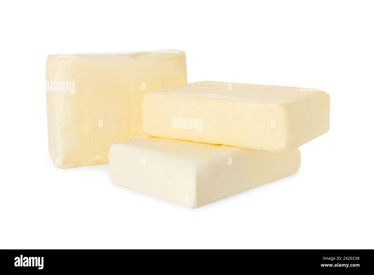 Blocks of tasty butter isolated on white Stock Photo - Alamy