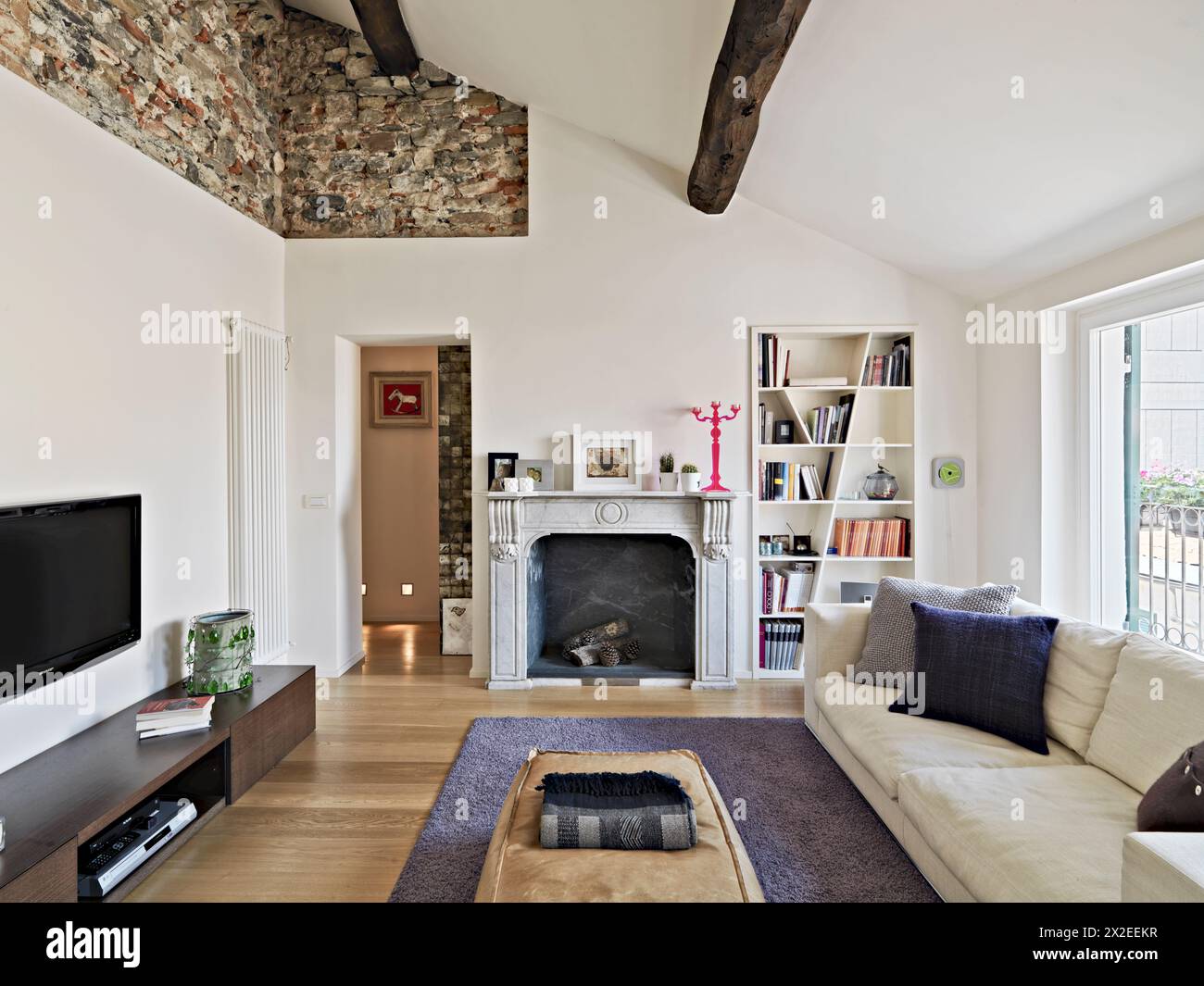 interior view of a modern living room in the attic room with ancient ...