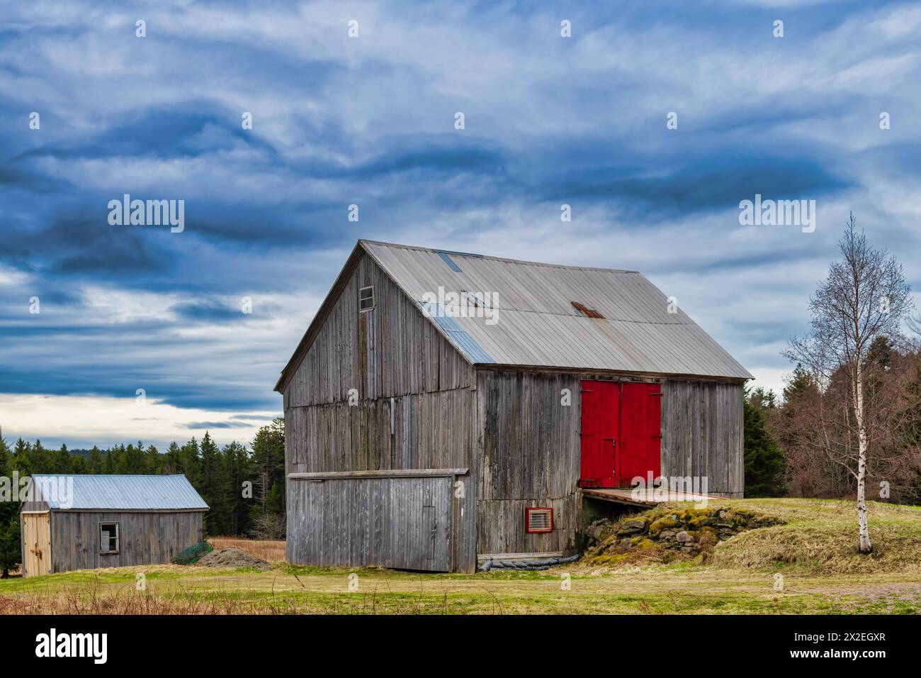 Old Barn with Red Door - views Stock Photo - Alamy