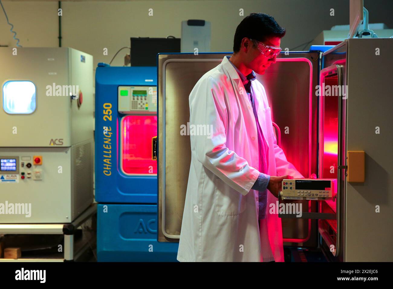 Researcher. Test climate at high and low temperatures. Climate Chamber ...