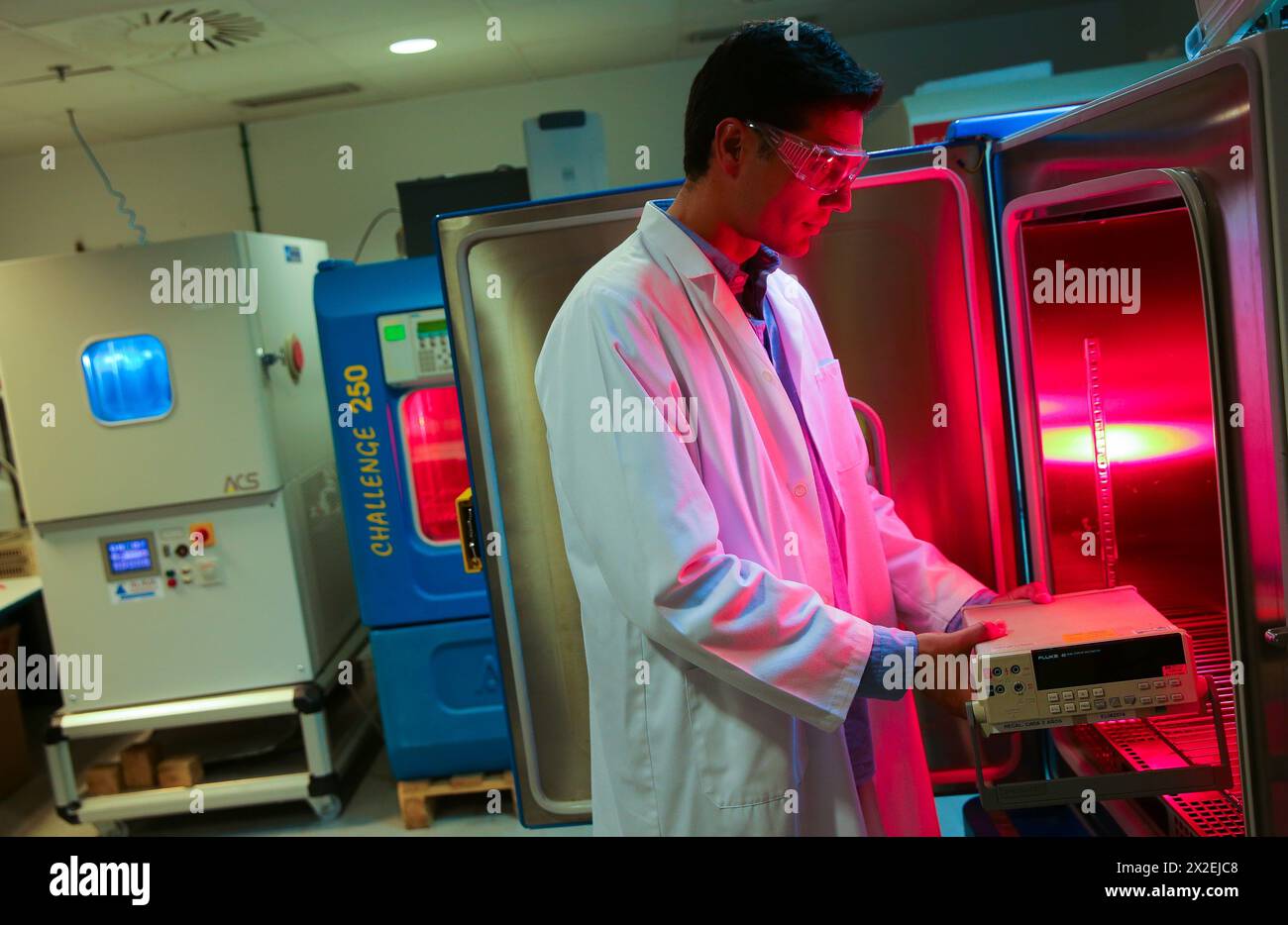 Researcher. Test climate at high and low temperatures. Climate Chamber ...