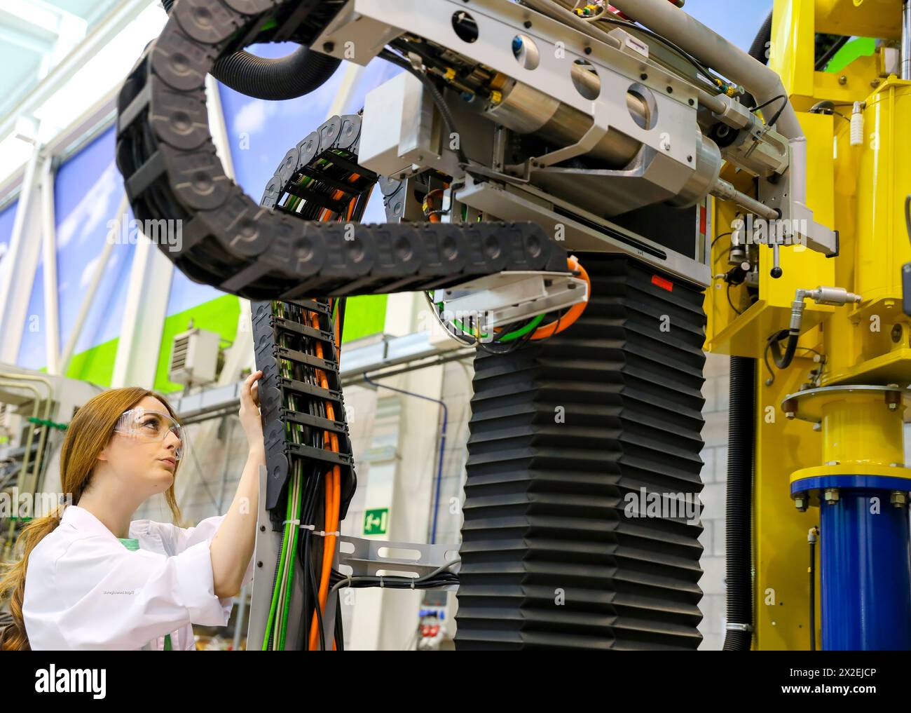 Robotic mobile platform for aeronautical drilling. Researcher working ...