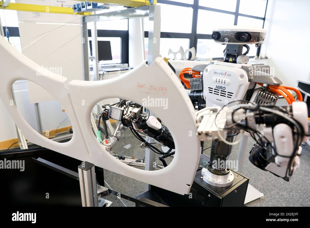 Robot with two arms for flexible robotics. Humanoid robot for automotive assembly tasks in ...