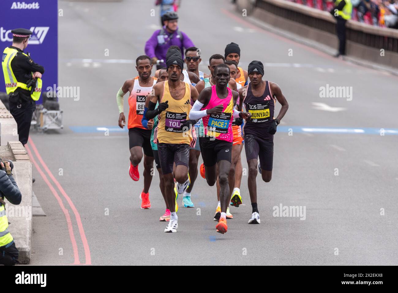 Alexander Mutiso Munyao, Tamirat Tola & leading group elite men competing in the TCS London ...