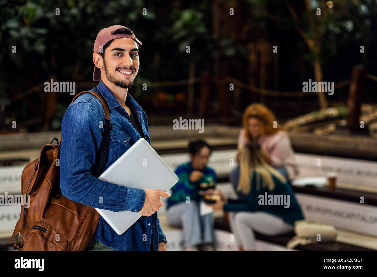 Male group college campus hi-res stock photography and images - Alamy