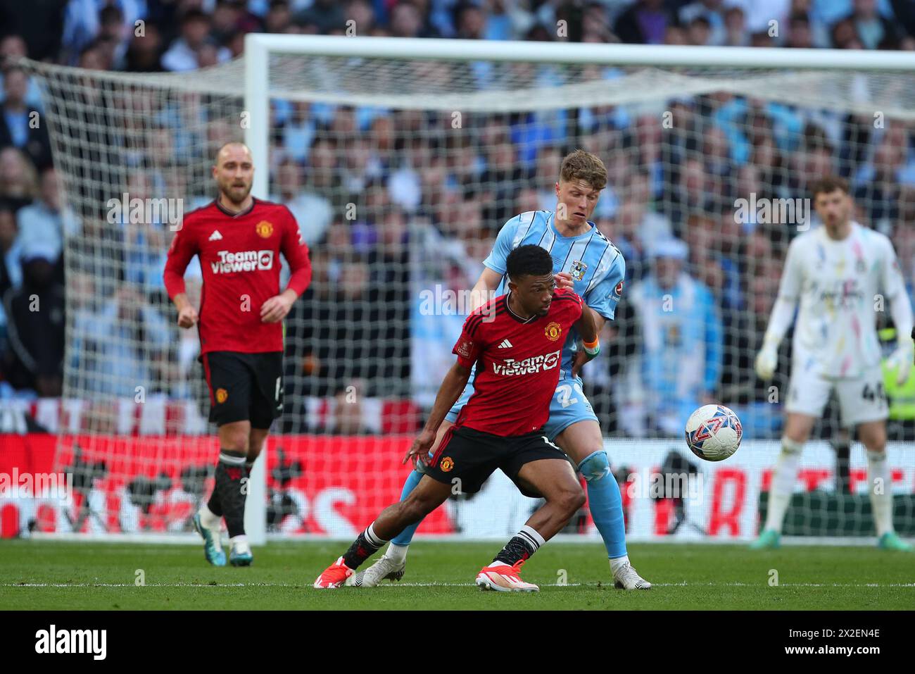 Amad Diallo of Manchester United and Victor Torp of Coventry City ...