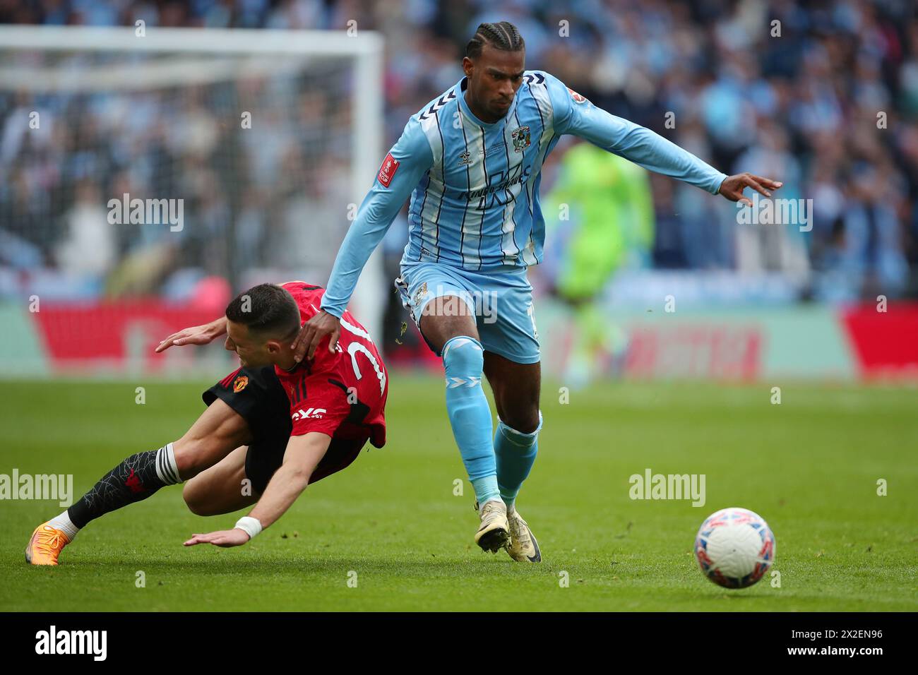 Haji Wright of Coventry City and Diogo Dalot of Manchester United ...