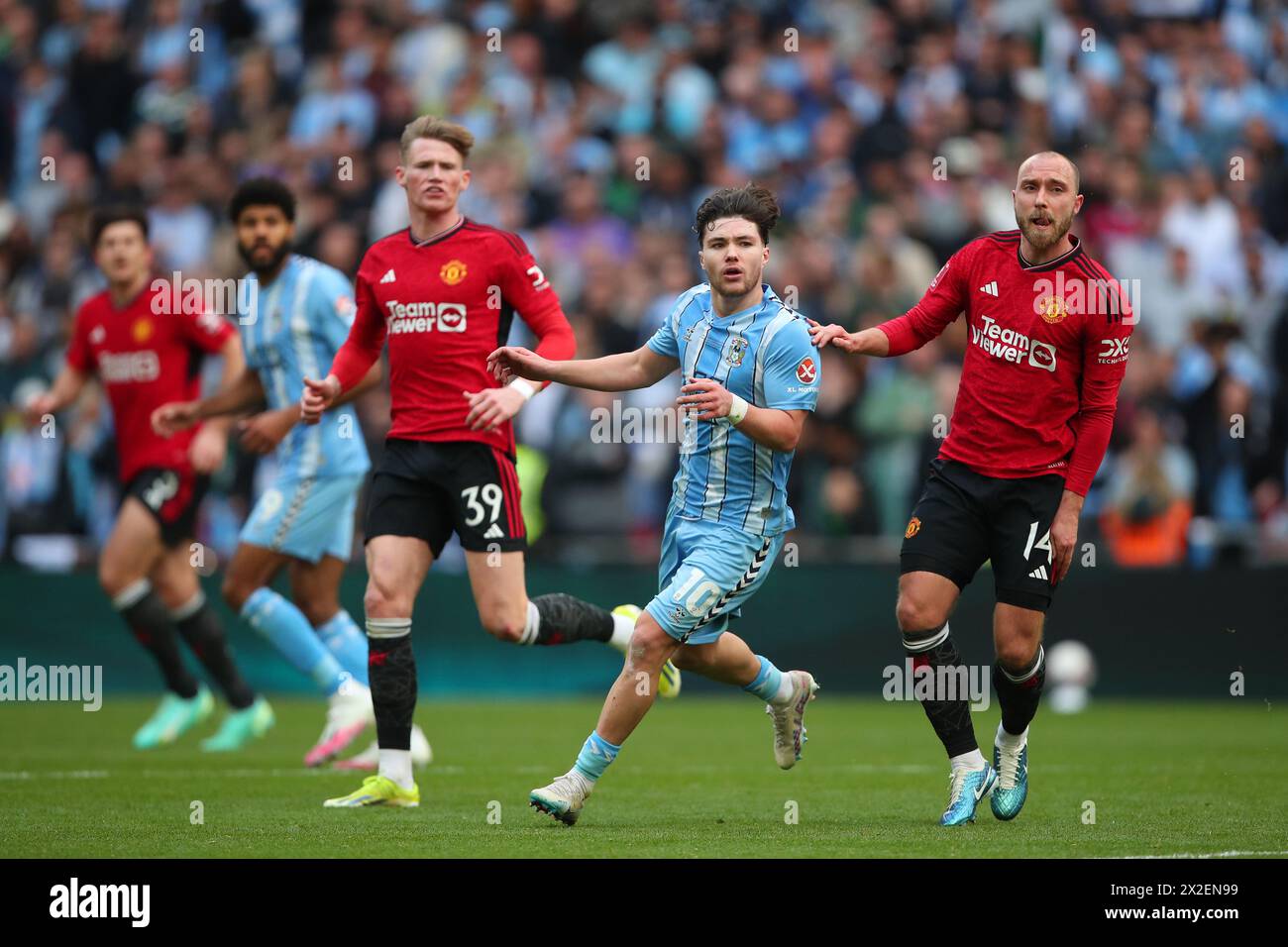 Callum O'Hare of Coventry City and Christian Eriksen of Manchester ...