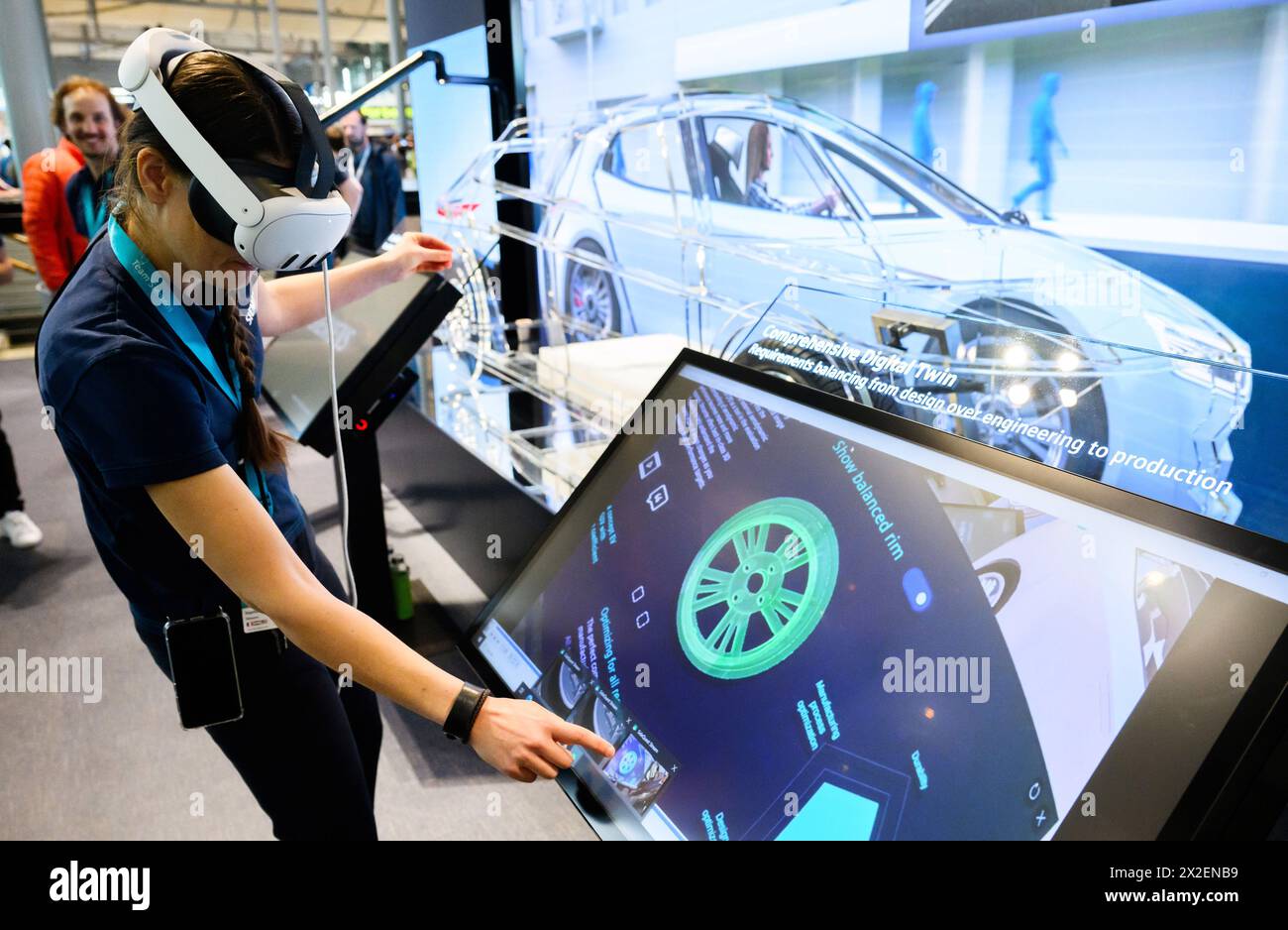 Hanover, Germany. 22nd Apr, 2024. A Siemens employee wearing AR ...