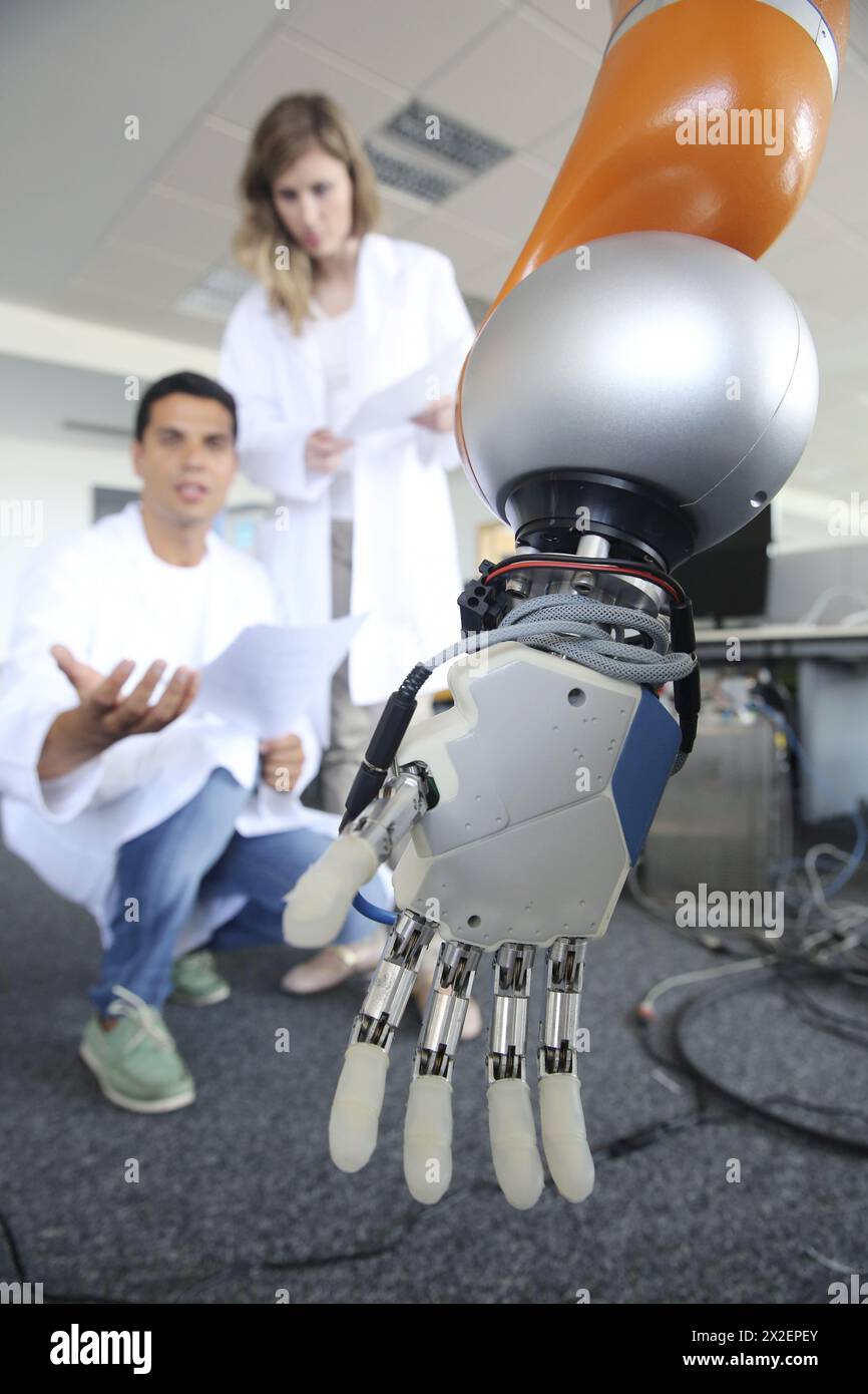 Humanoid Robot For Automotive Assembly Tasks In Collaboration With People And And Lwr Robot