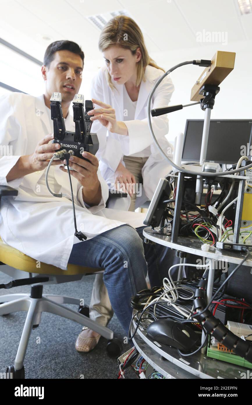 Humanoid Robot For Automotive Assembly Tasks In Collaboration With People And And Lwr Robot