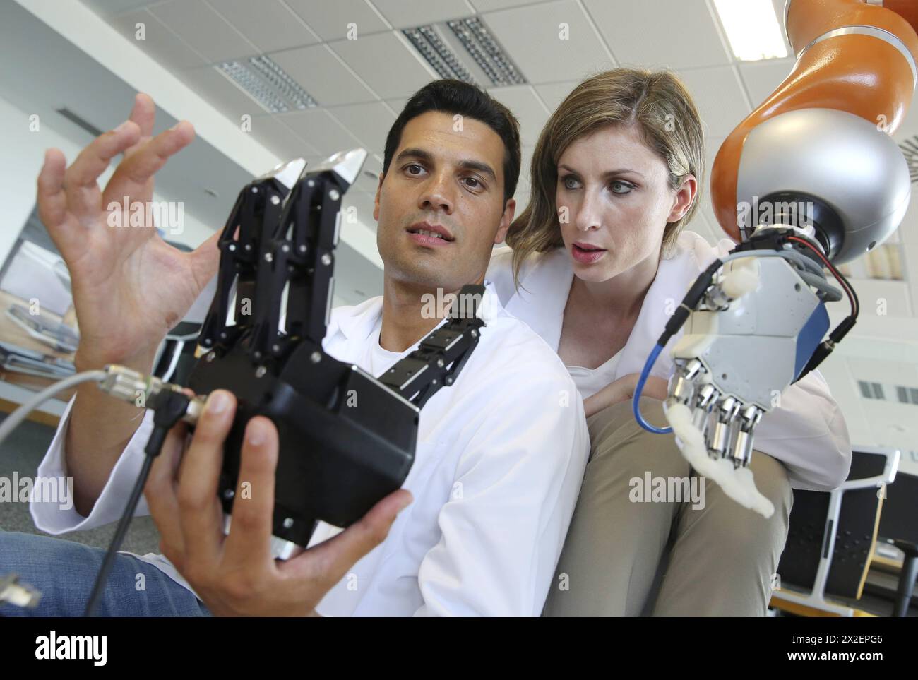 Humanoid Robot For Automotive Assembly Tasks In Collaboration With People And And Lwr Robot