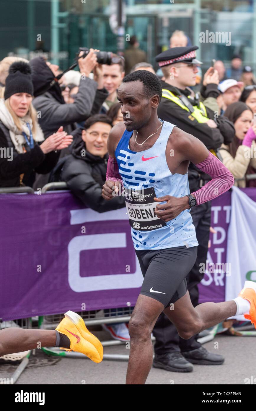 Addisu Gobena competing in the TCS London Marathon 2024 passing through Tower Hill, London, UK ...