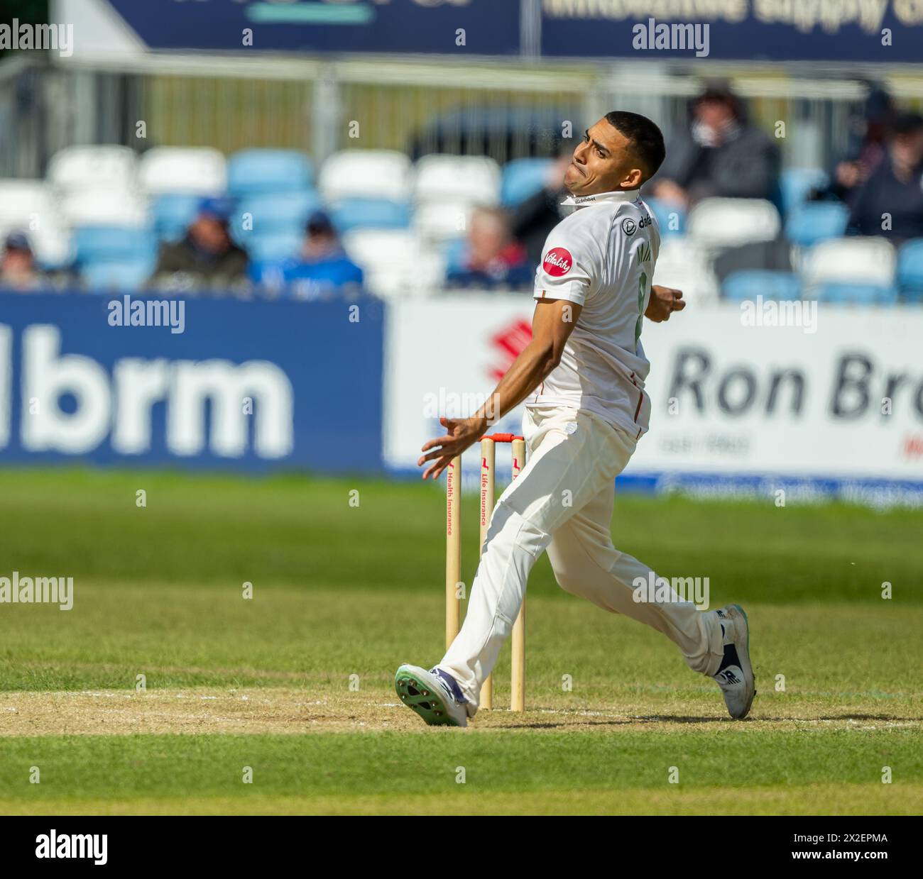 Ben Mike bowling for Leicestershire in a Vitality County Championship ...