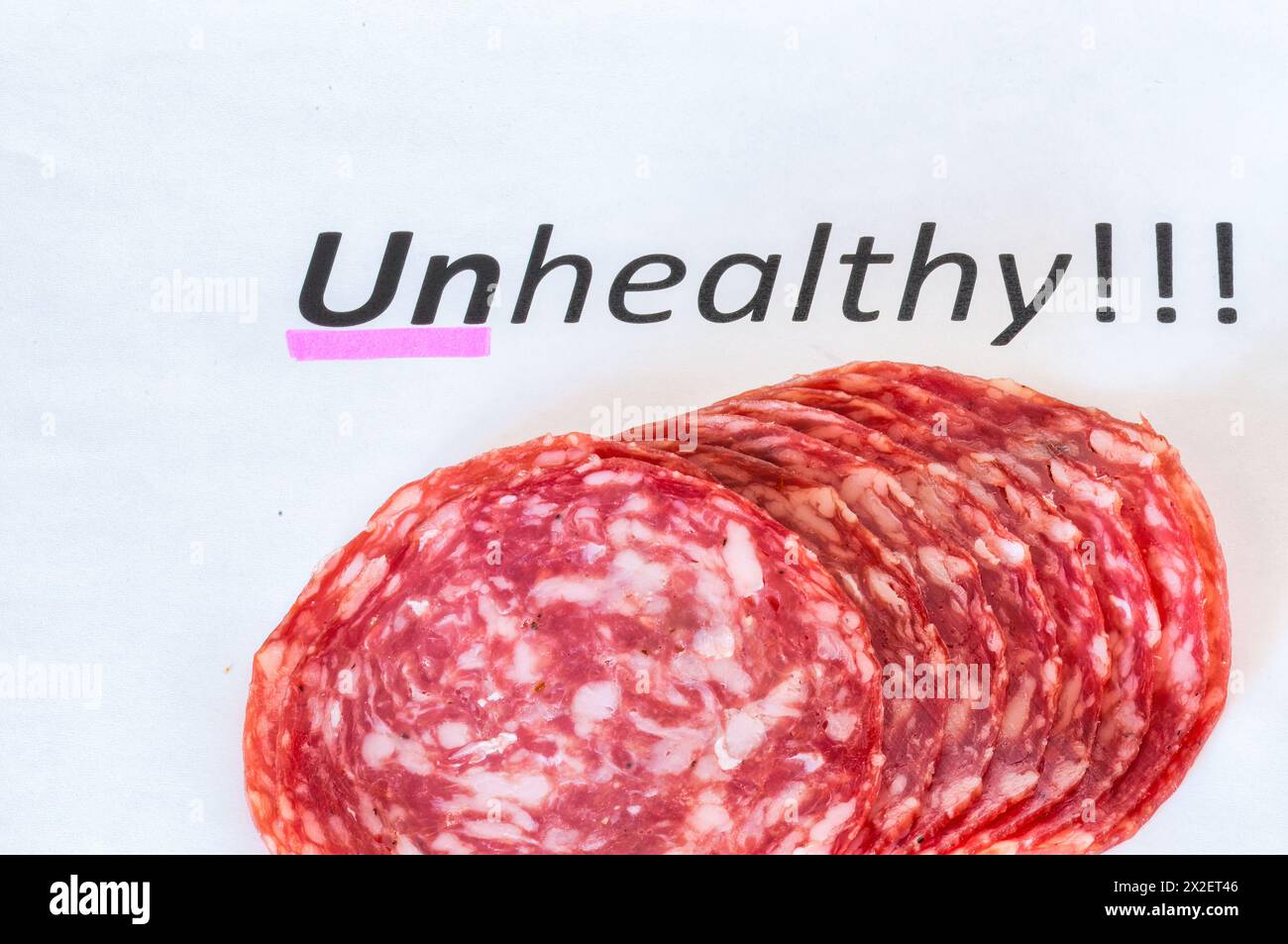 Text warning in unhealthy processed food Stock Photo - Alamy