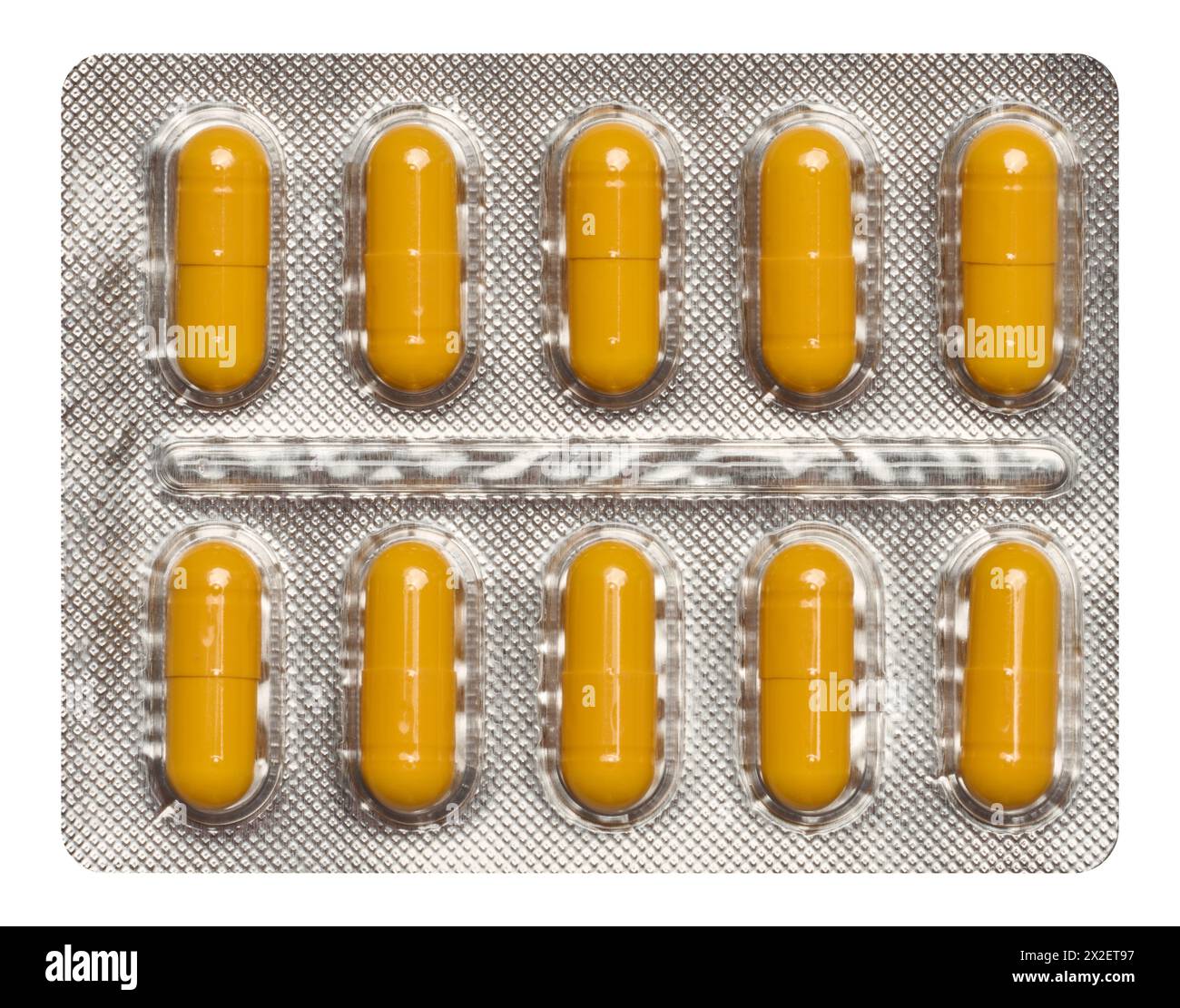 Oval yellow tablets in white plastic packaging, top view Stock Photo ...
