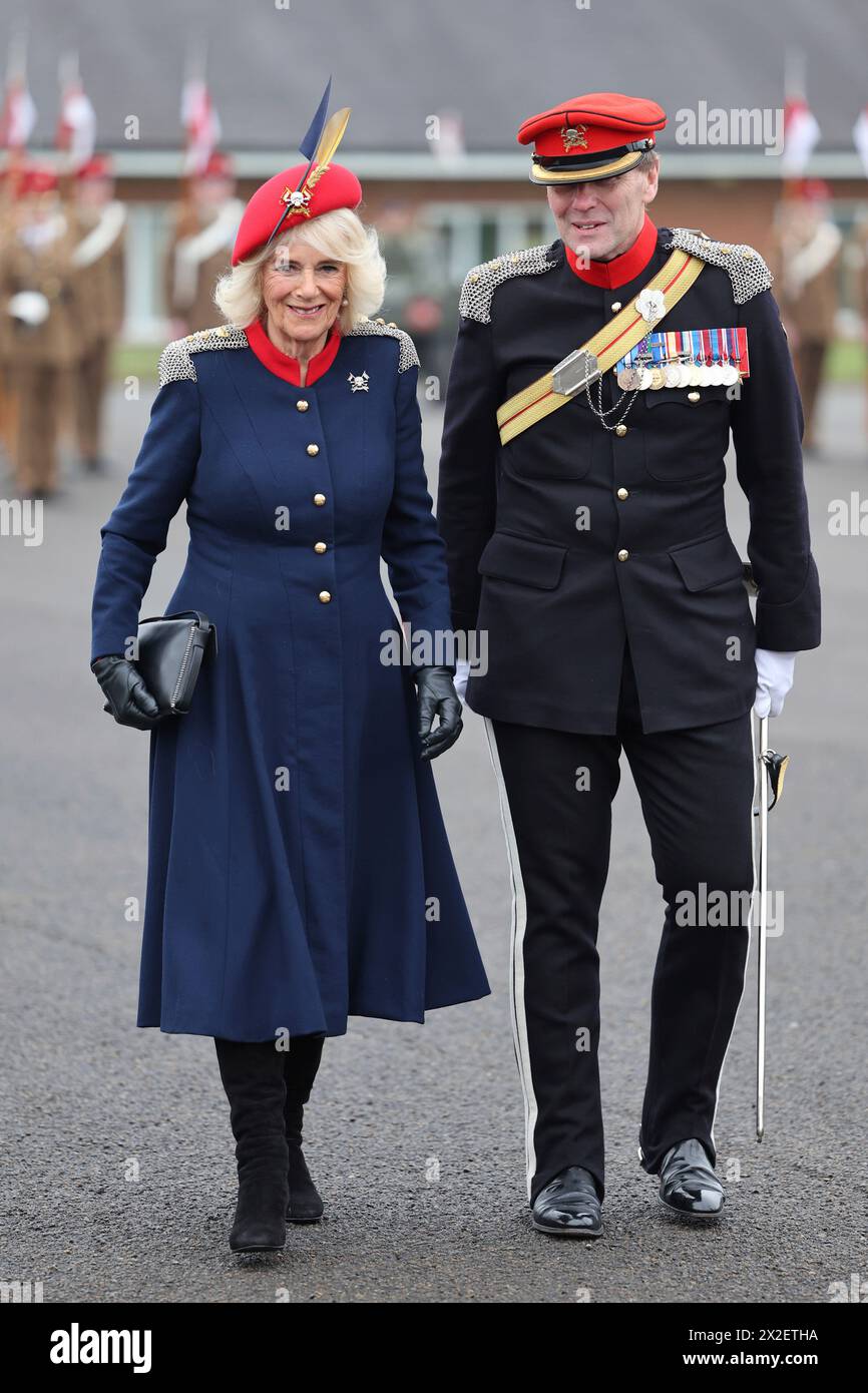 Britain's Queen Camilla and Colonel Richard Charrington inspects the ...