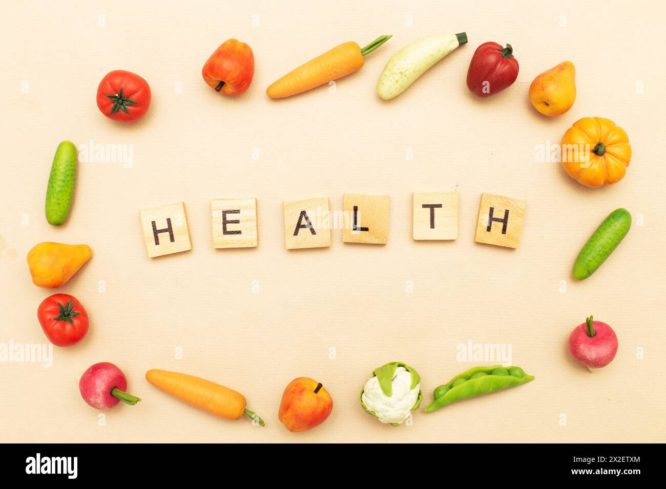 Different healthy food products on a beige background. Health word made ...