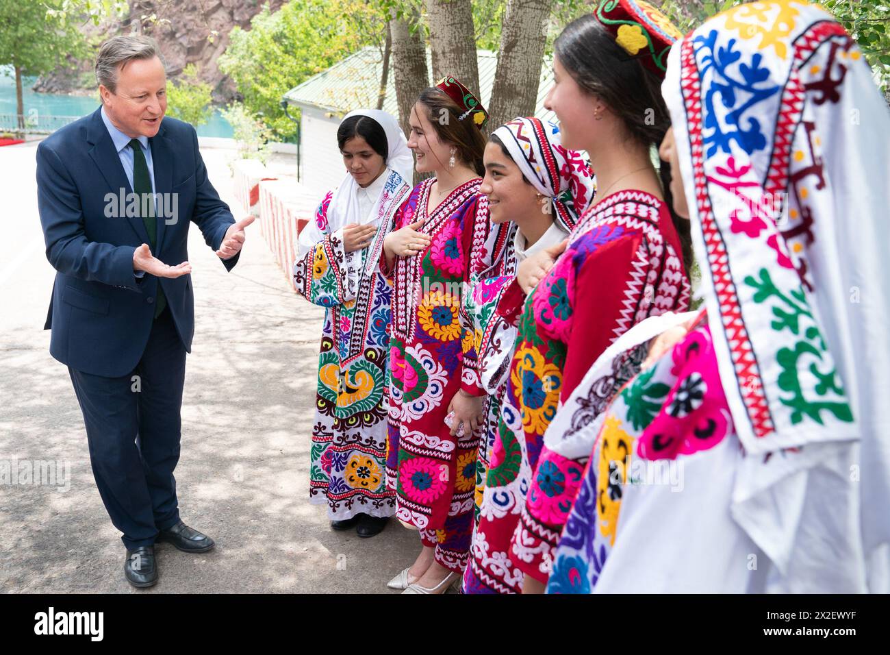 Foreign Secretary Lord David Cameron meets traditional dancers at the ...