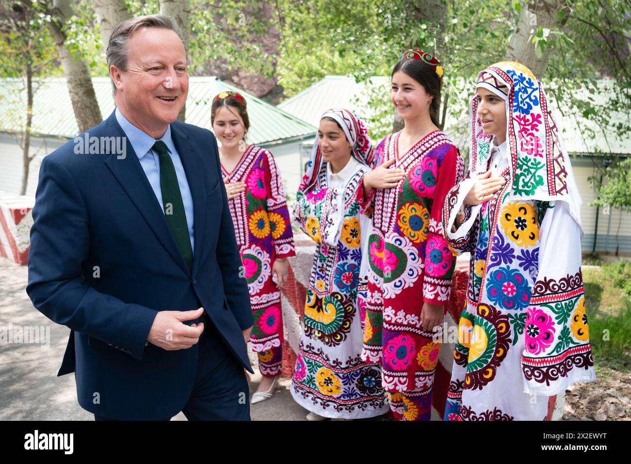 Foreign Secretary Lord David Cameron meets traditional dancers at the ...
