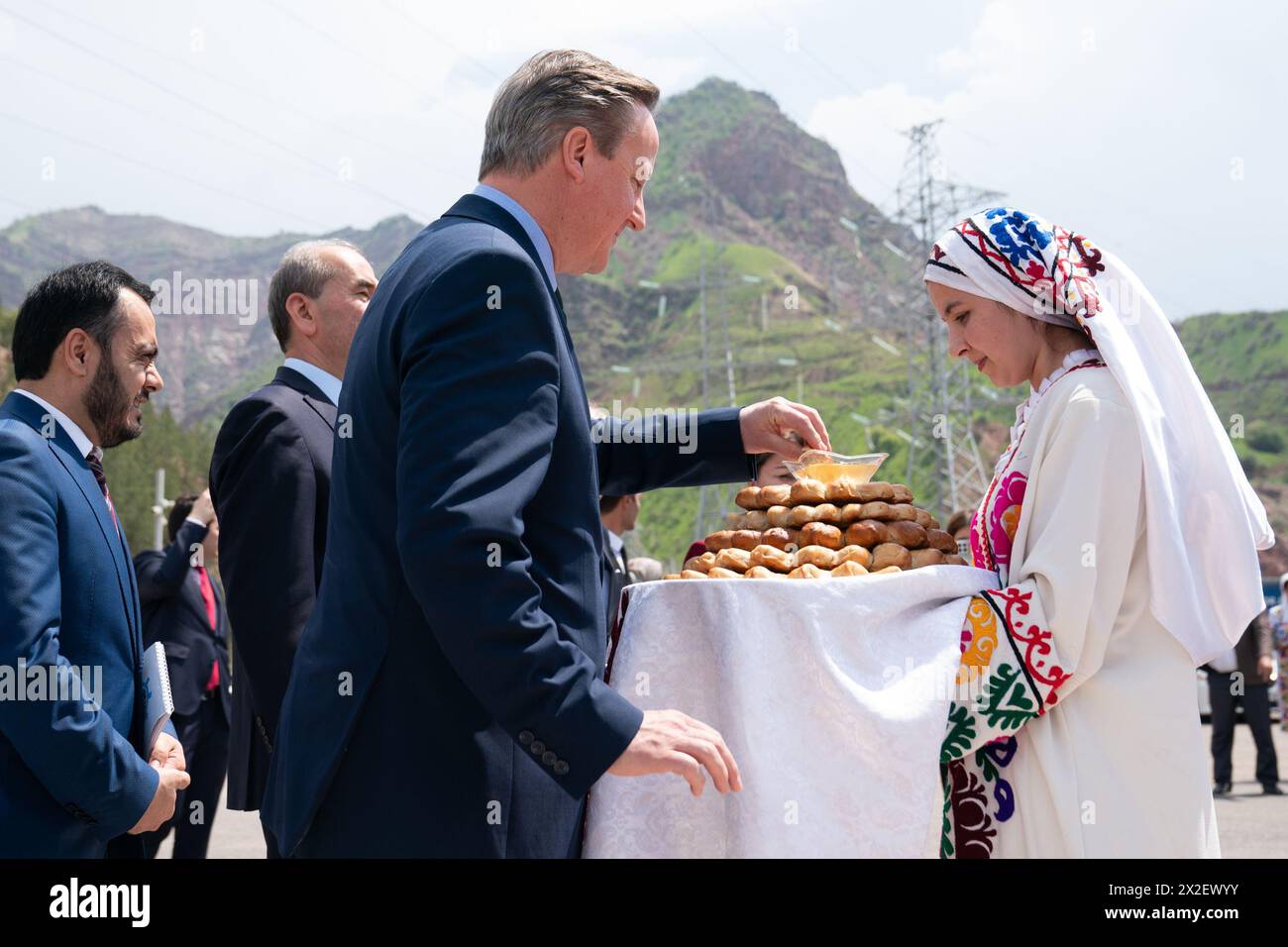 Foreign Secretary Lord David Cameron meets traditional dancers at the ...