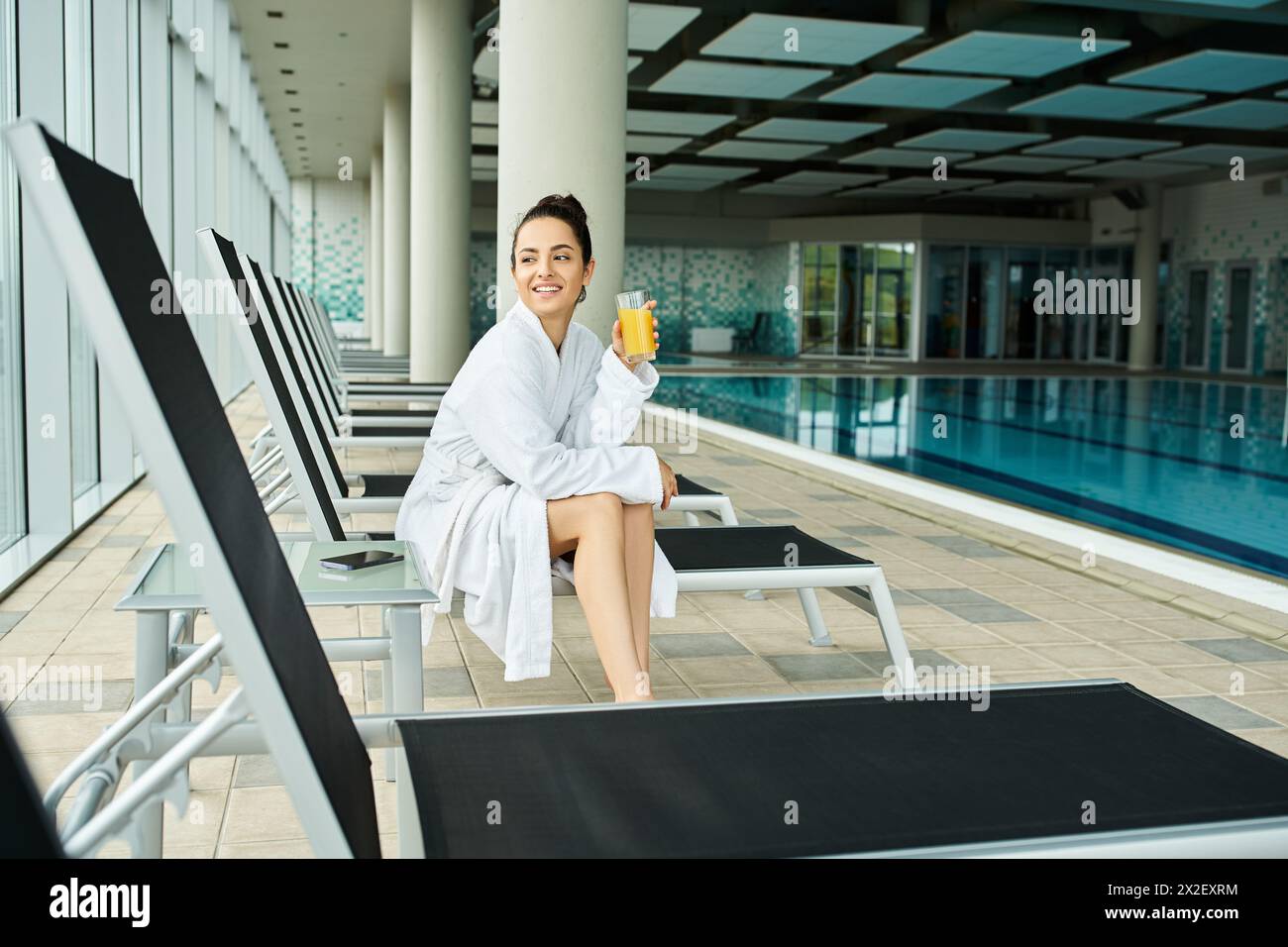 Pool lounge chair woman relaxing hi-res stock photography and images ...