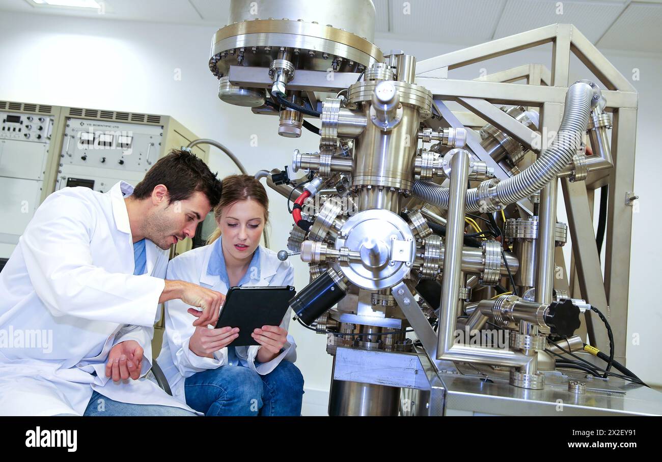 Researchers. Surface spectrometer, Photoelectron spectroscopy, Auger ...