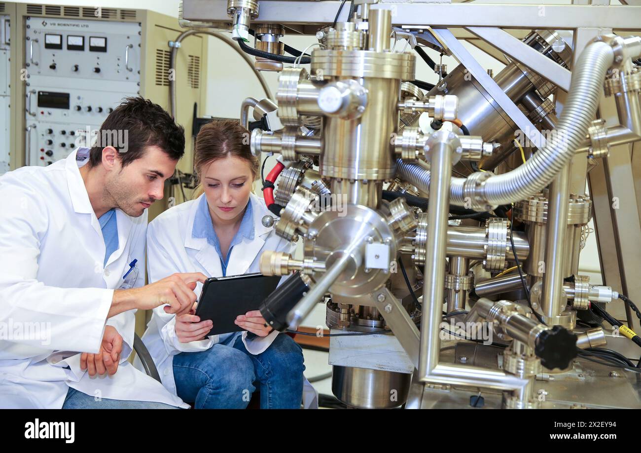 Researchers. Surface spectrometer, Photoelectron spectroscopy, Auger ...