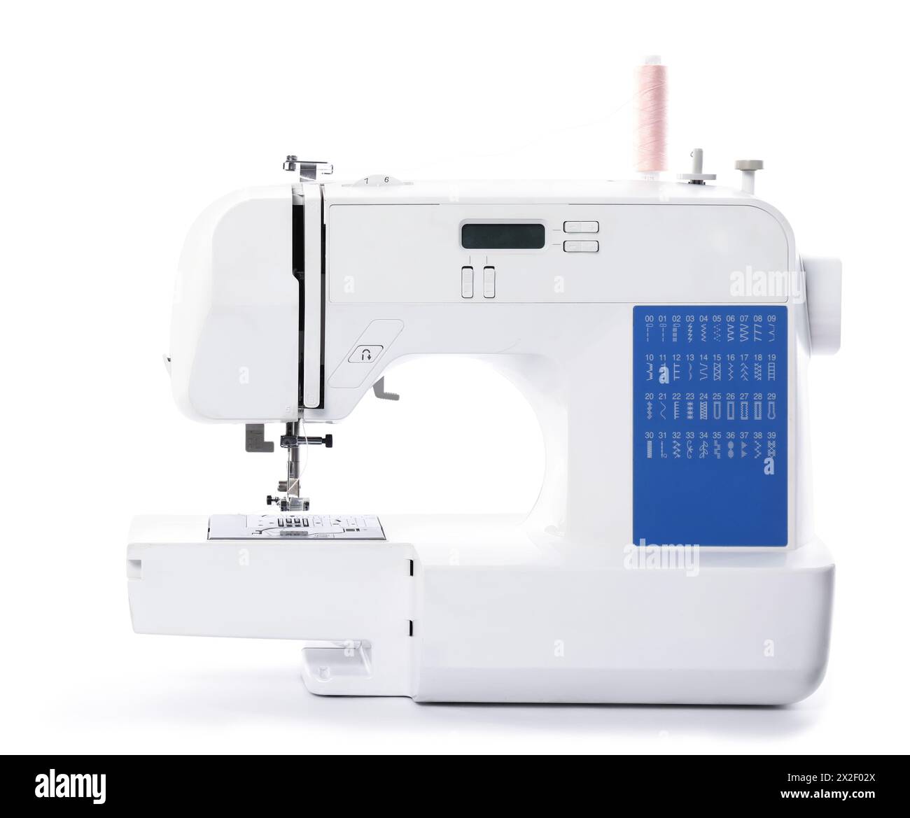 One modern sewing machine isolated on white Stock Photo - Alamy