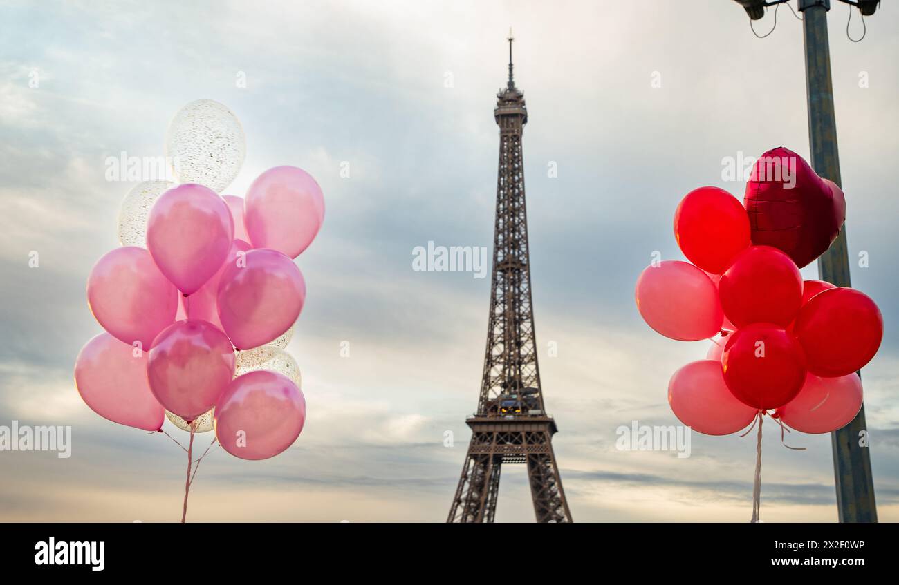 pink and red balloons in front of Eiffel tower, Paris, city of love ...