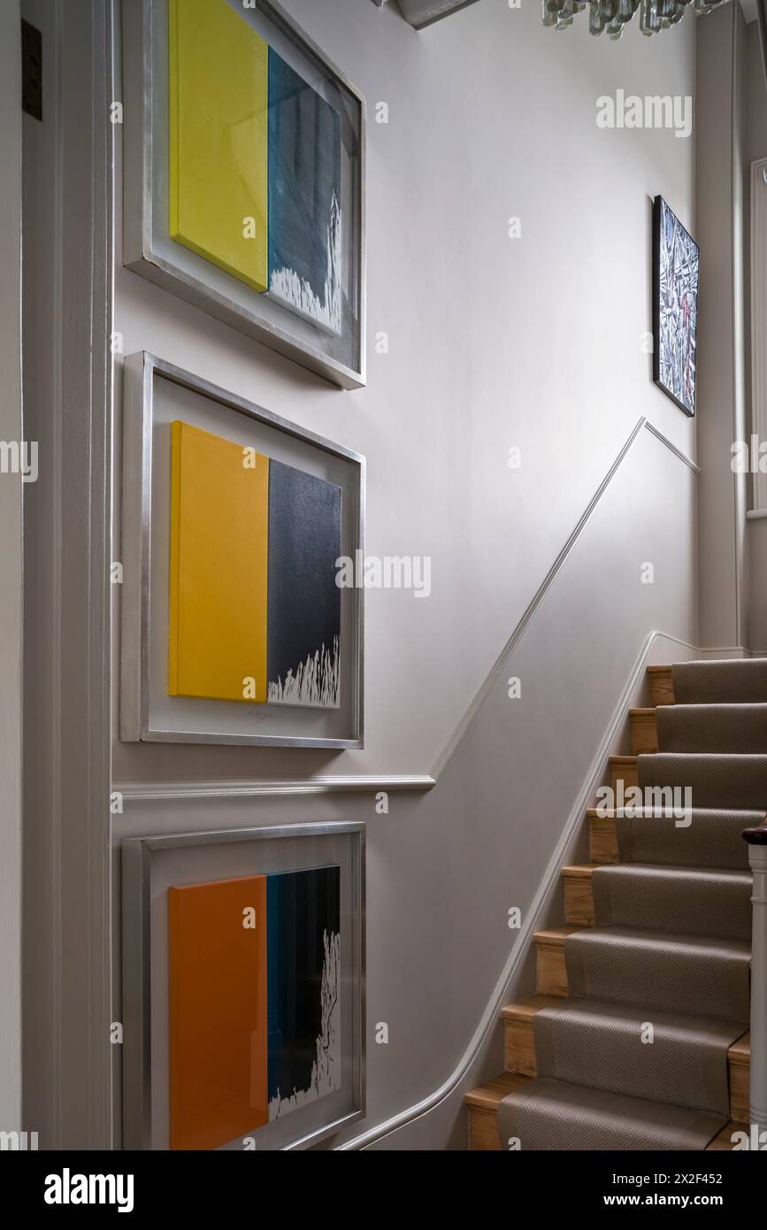 Framed modern artwork in hallway of Georgian townhouse, Paultons Square ...