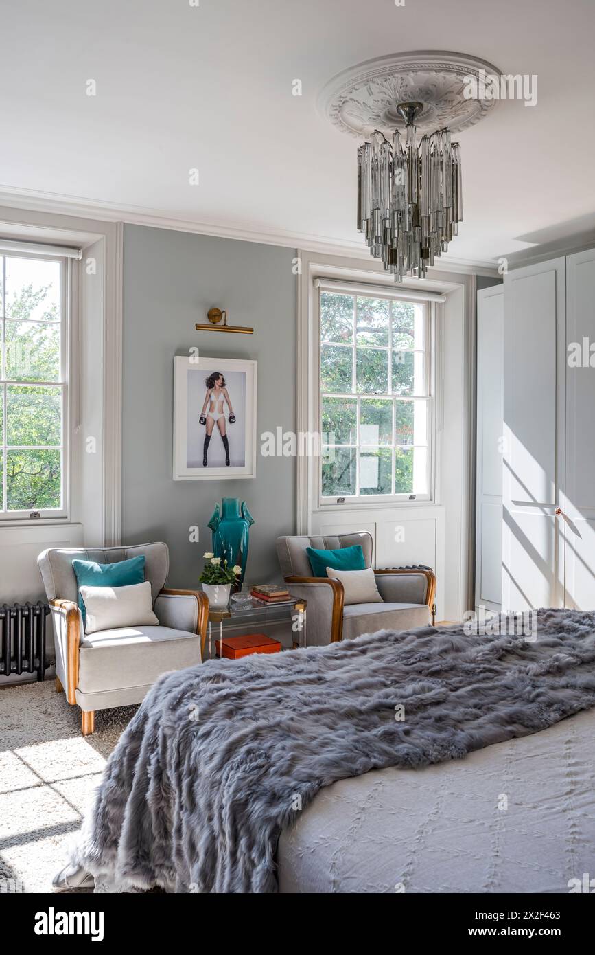 Pair of amrchairs in windows of Georgian townhouse, Paultons Square ...