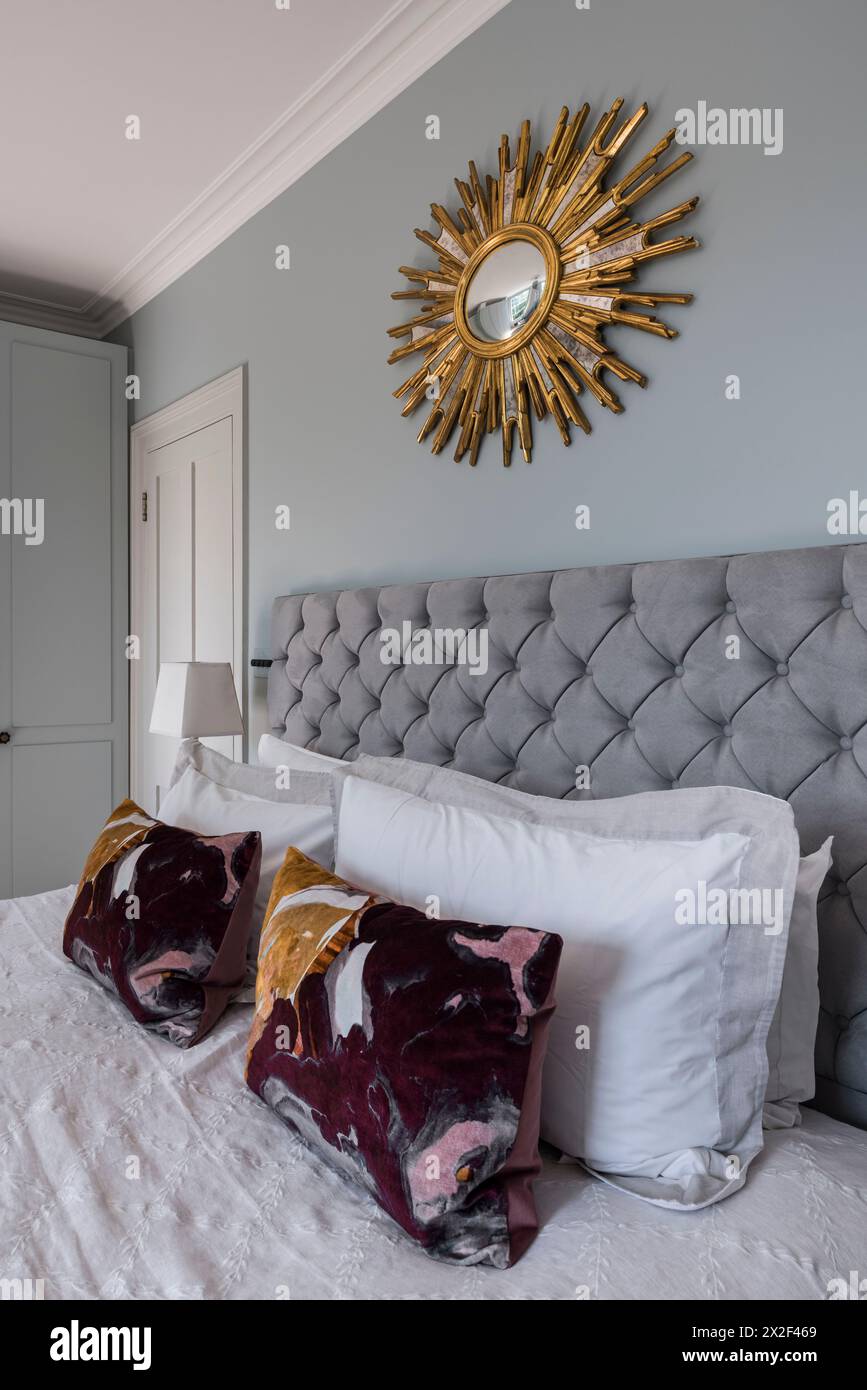 Sunburst mirror above bed in Georgian townhouse, Paultons Square ...