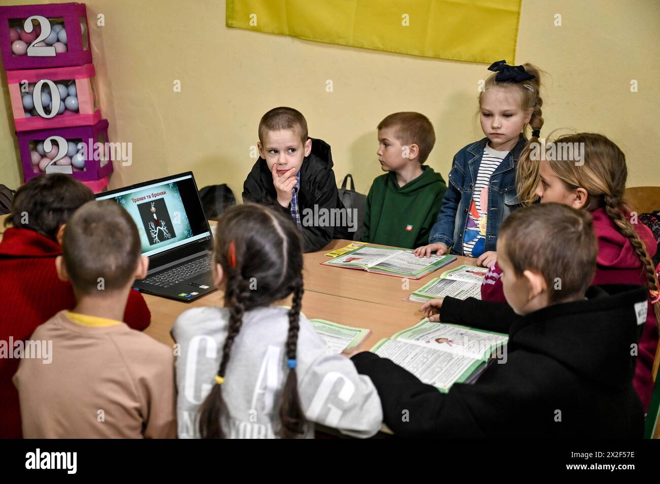 NOVOVASYLIVKA, UKRAINE - APRIL 19, 2024 - Children attend a lesson in ...