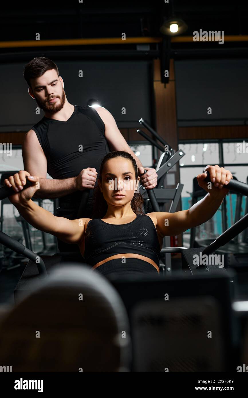 Male trainer assisting man hi-res stock photography and images - Alamy
