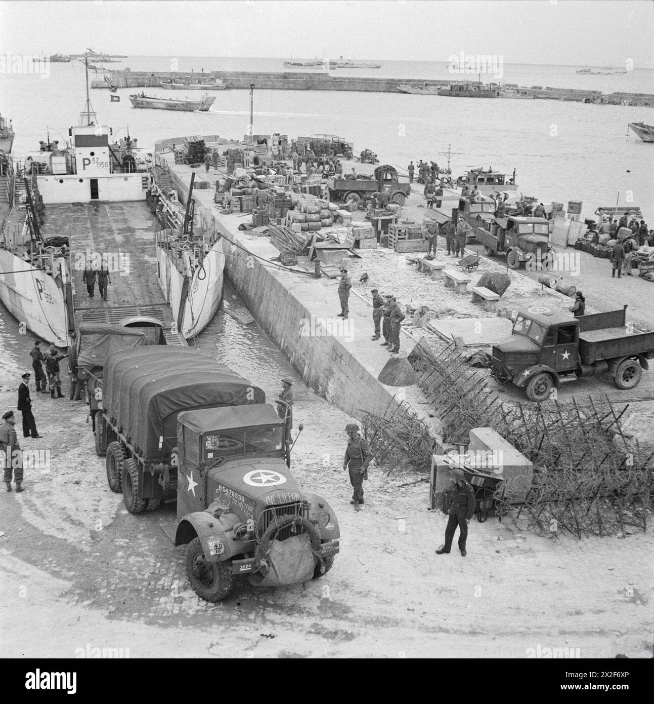THE BRITISH ARMY IN NORMANDY 1944 - A 6-ton Mack NM 6x6 truck comes ...