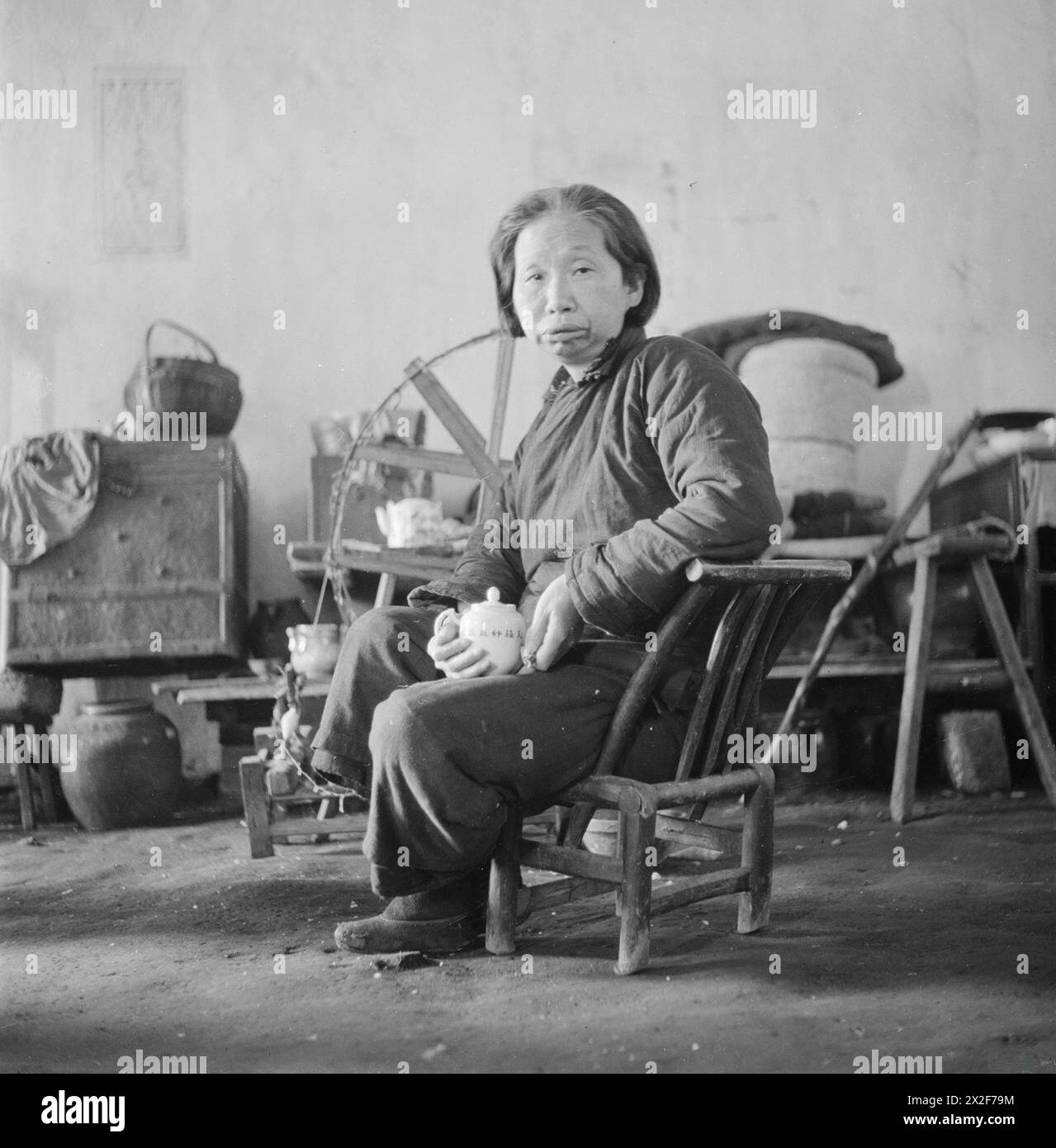 CECIL BEATON PHOTOGRAPHS: GENERAL - China 1944: An old woman seated on ...
