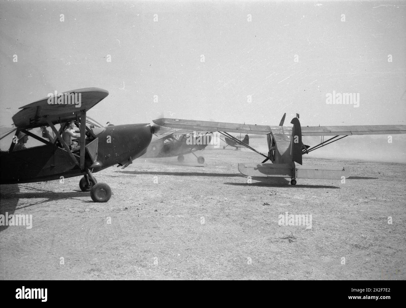 Sentinel aircraft of No. 194 Squadron RAF line up for takeoff on a ...