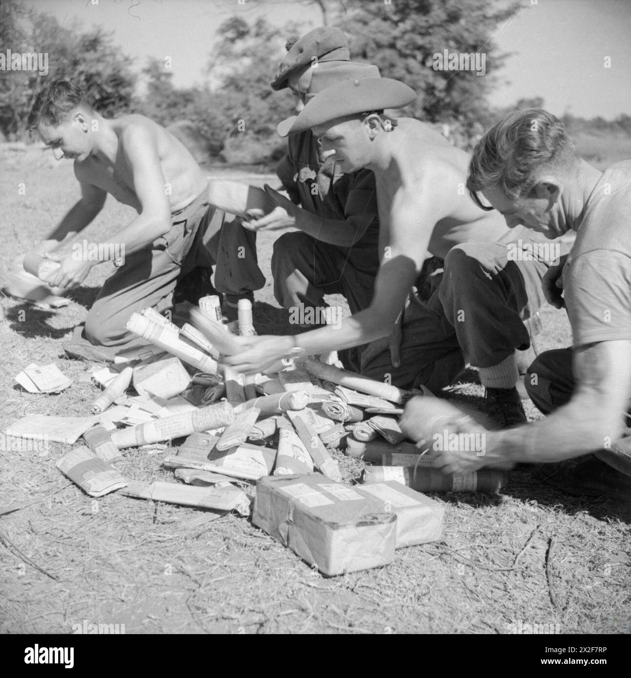 THE BRITISH ARMY IN BURMA 1945 - Soldiers searching through letters and ...