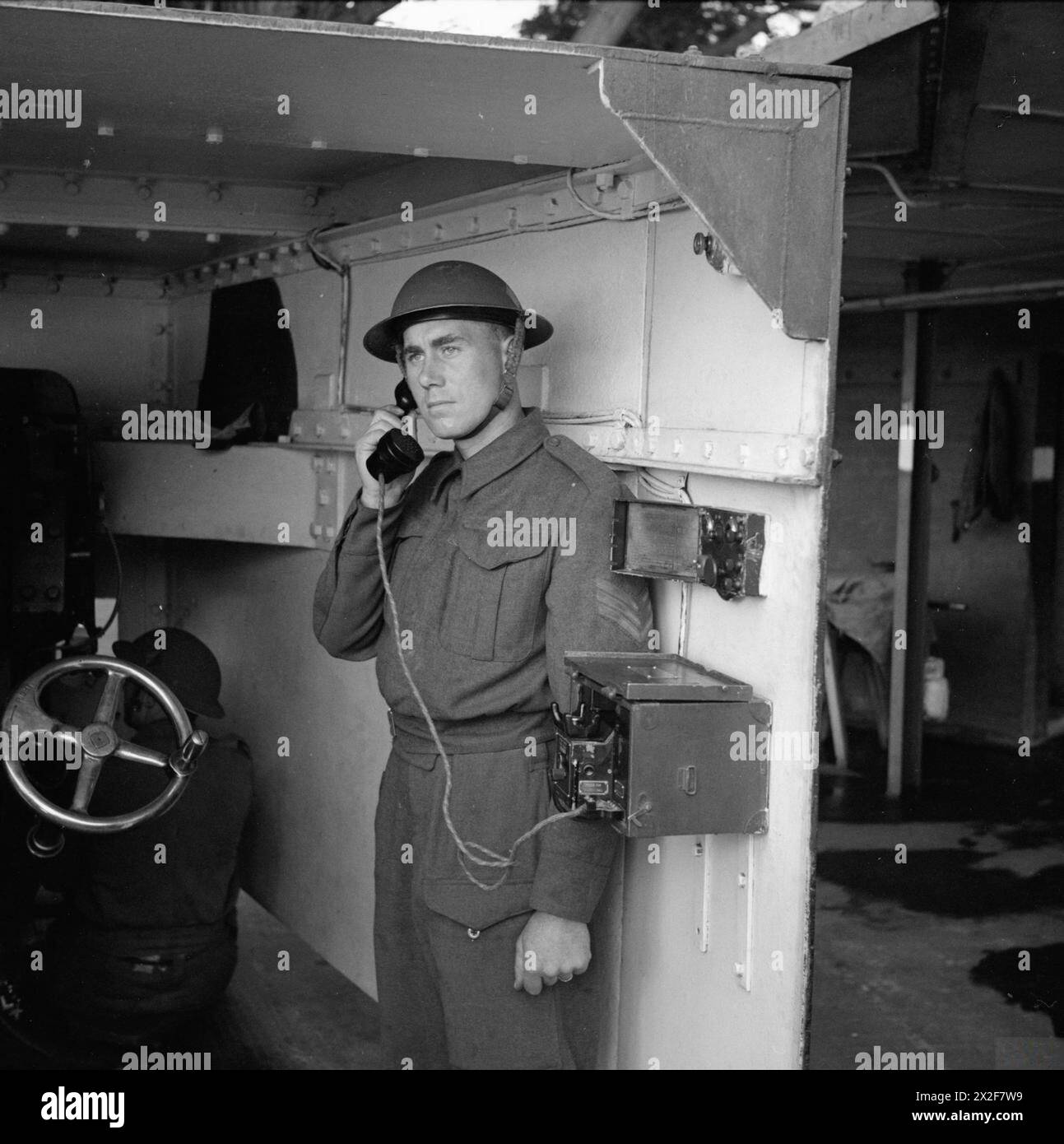 A British coastal battery during World War II shows a sergeant ...