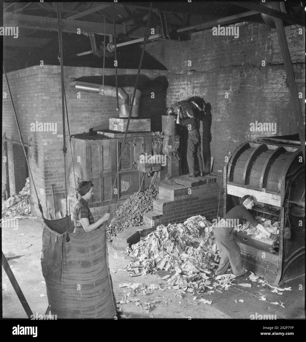 OLD RAGS INTO NEW CLOTH: SALVAGE IN BRITAIN, APRIL 1942 - Men and women ...
