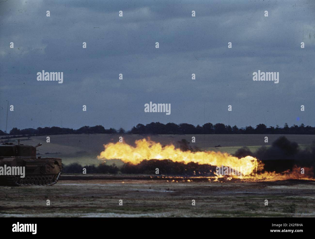 FLAMETHROWERS IN ACTION AUGUST 1944 A Churchill Tank Fitted With A