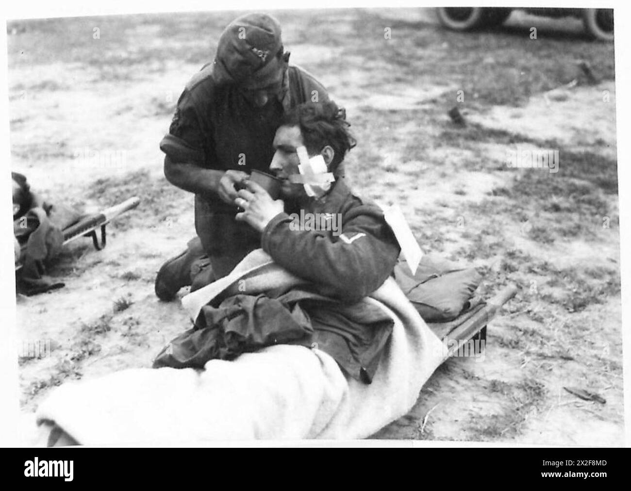 Wounded german soldier receives hi-res stock photography and images - Alamy